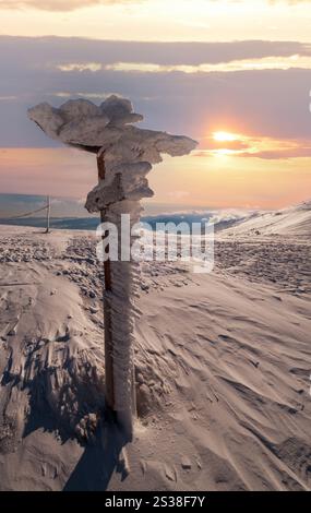 Snowy mountain landscape on a sunny day. Snowy trees and bright blue ...