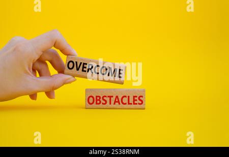 Overcome obstacles symbol. Concept words Overcome obstacles on wooden ...