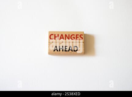 Changes ahead symbol. Wooden blocks with words Changes ahead ...