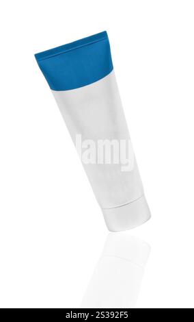 Blank tube and toothpaste on white background Stock Photo - Alamy