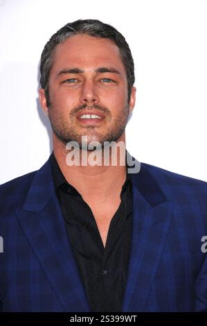 Taylor Kinney at the premiere of 'The Other Woman' at the Regency ...