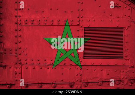 Morocco flag depicted on side part of military armored tank close up ...