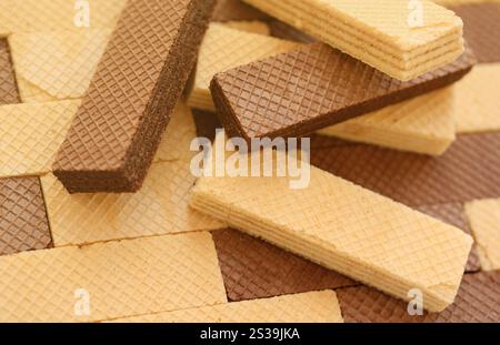 Stacked delicious chocolate wafers in large amount. Two different ...