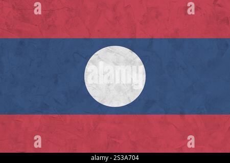 Laos flag depicted in bright paint colors on old relief plastering wall ...