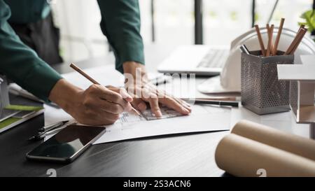 Green Eco Architecture Man drawing on architectural Creative project ...