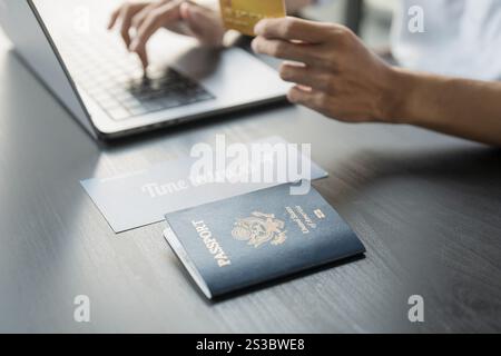 Booking tickets online - passport with air tickets on keyboard Stock ...
