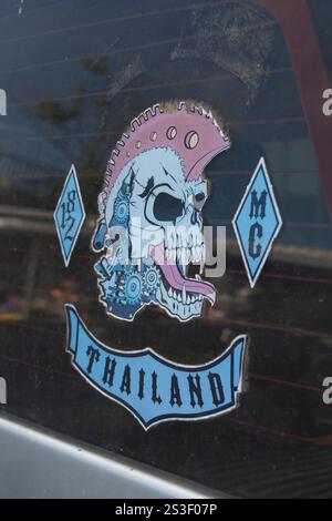 motorcycle club sticker on the rear windscreen of a pick-up truck in ...