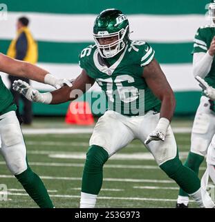 New York Jets guard John Simpson (76) participates during NFL football ...