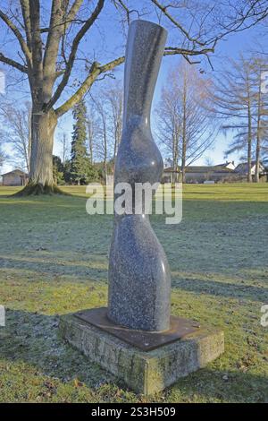 A photograph of smooth round granite rocks on a beach Stock Photo - Alamy