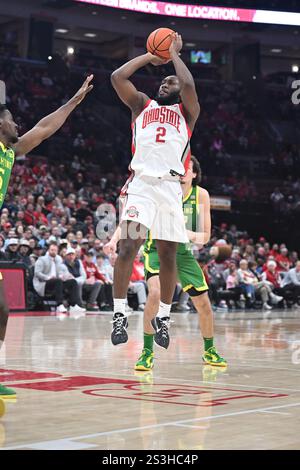 Ohio State guard Bruce Thornton (2) passes around Iowa guard Drew ...