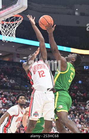 Ohio State guard Evan Mahaffey (12) fouls Oregon center Nate Bittle (32 ...