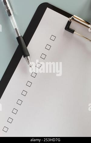Checklist boxes with pen on white paper. Check form concept Stock Photo ...