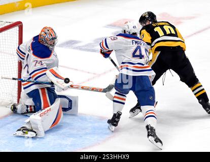 Edmonton Oilers defenseman Ty Emberson (49) chases after San Jose ...