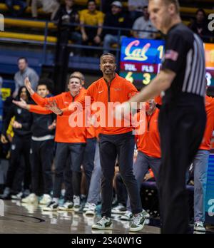 Virginia head coach Ron Sanchez gives directions to guard Andrew Rohde ...