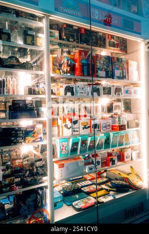 A bright shop window showcasing Nintendo Switch consoles, accessories ...