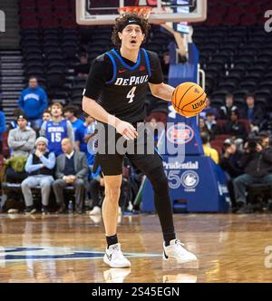 DePaul Blue Demons guard Conor Enright (4) brings the ball up court ...
