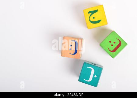 Wooden Arabic Alphabet Blocks isolated on white background ...