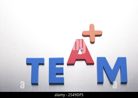 Team word on metal background, part of a series of business words Stock ...