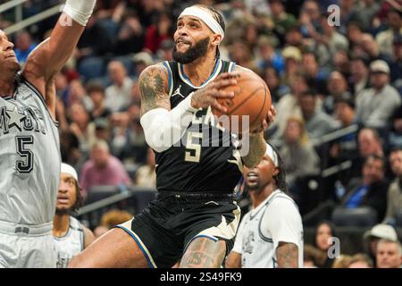 Milwaukee Bucks' Gary Trent Jr., front, argues a call against the ...