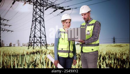 Engineers Using Computer Technology New Energy Tower. Electricity And ...