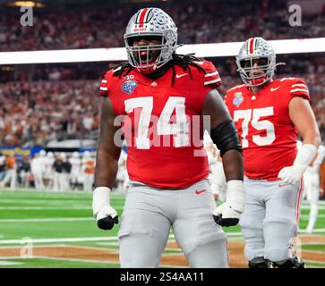 Ohio State offensive lineman Donovan Jackson speaks during a press ...