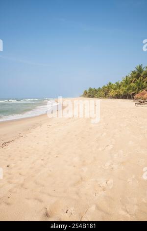 Scenic view of a beach at Assinie, Assinie-Mafia, showcasing golden ...