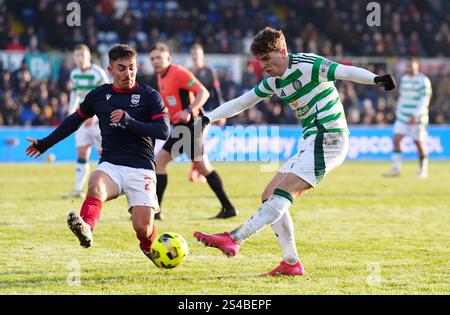 Ross County's Joshua Nisbet (left) and Celtic's Cameron Carter-Vickers ...