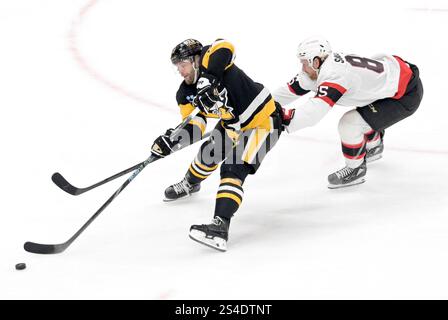 Ottawa Senators Jake Sanderson (85) tries to defend against Toronto ...