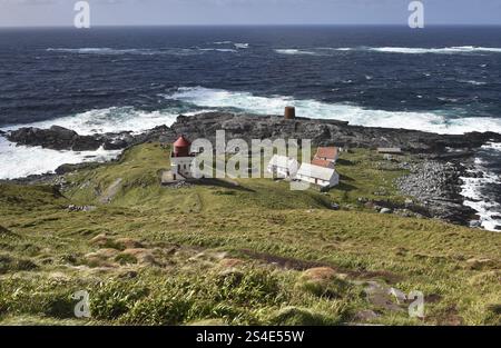 The lighthouse Runde fyr on the island Runde on the Atlantic west coast ...