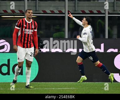 Milan, Italy. 11th Jan, 2025. AC Milan's Christian Pulisic (L) vies ...