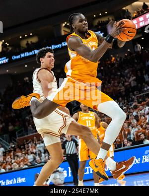 Tennessee center Felix Okpara (34) is fouled as he goes for a shot by ...