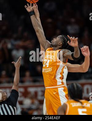 Tennessee center Felix Okpara (34) shoots over Rice forward Jimmy ...