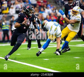 Houston Texans quarterback C.J. Stroud (7) greets running back Joshua ...