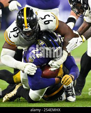 Pittsburgh Steelers defensive tackle Derrick Harmon takes a break ...