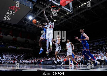 Kansas forward Flory Bidunga (40) shoots over Oklahoma State forward ...