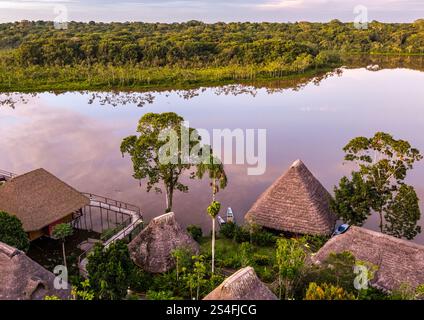 View from above of Anangu Lake and Amazon rainforest jungle at dusk ...