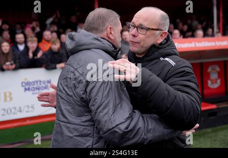 Tamworth manager Andy Peaks (right) greets Tottenham Hotspur manager ...