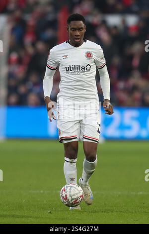Lamine Fanne (22) of Luton Town warms up ahead of the Sky Bet League 1 ...