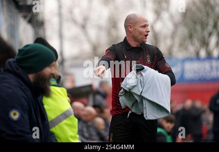 Tamworth's Tom Tonks using a towel provided by the paramedics to dry ...