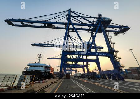 Yangpu, China's Hainan Province. 9th Jan, 2025. Containers are ...