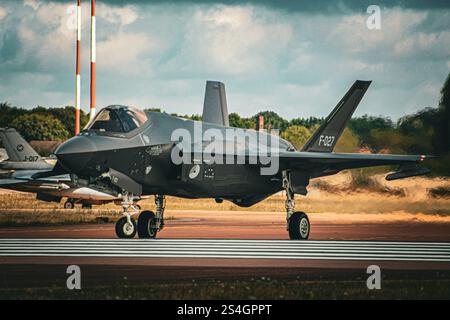 a fighter jet on an airport getting ready to take off Stock Photo - Alamy