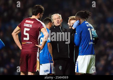 Rangers’ Clinton Nsiala (right) receiving treatment during the William ...