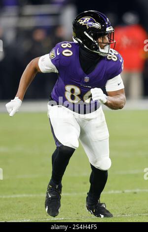 Baltimore Ravens tight end Isaiah Likely adjusts his helmet during ...