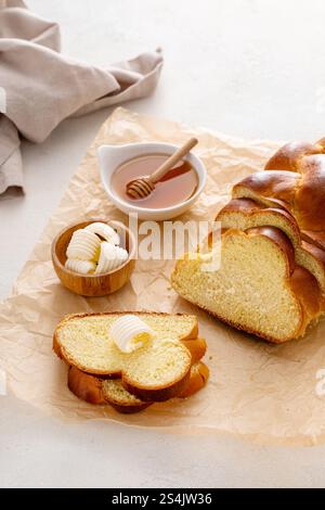 Sliced fresh challah bread on the wood table Stock Photo - Alamy