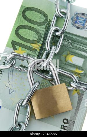 Lock security and chain on euro banknotes background. Monetary crisis ...