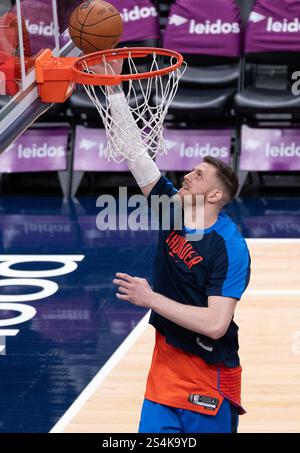 Oklahoma City Thunder center Isaiah Hartenstein adjusts his mask during ...