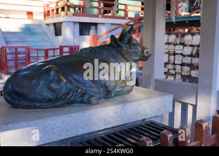 A guardian statue of cow at Kameido Tenjin shrine Stock Photo - Alamy