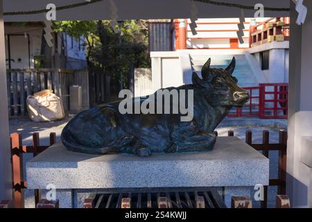 A guardian statue of cow at Kameido Tenjin shrine Stock Photo - Alamy