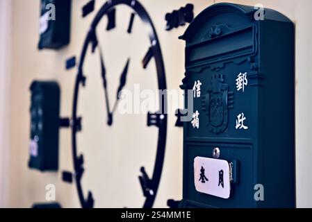 Clock and heritage post boxes display in Shantou Postal Bureau ...