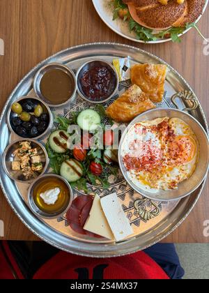 Traditional Turkish Breakfast with eggs, salad, borek, turkish eggs ...